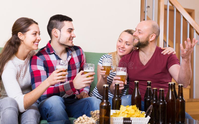 Adults Drinking Beer Indoor Stock Photo - Image of couple, chips: 62549600