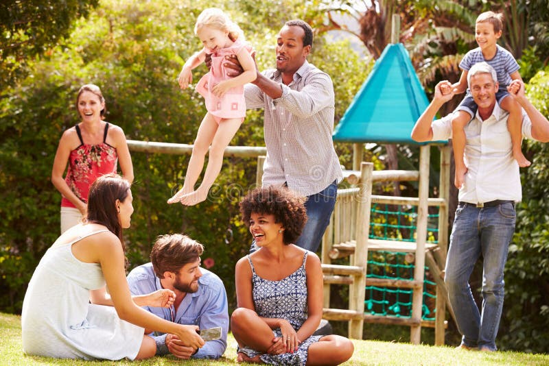 Adults and Kids Having Fun in a Garden Stock Image - Image of climbing ...