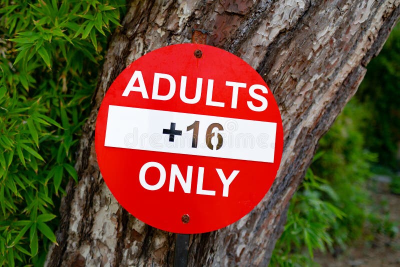 Adults only Sign 16 Hanging on a Tree Stock Photo - Image of people ...