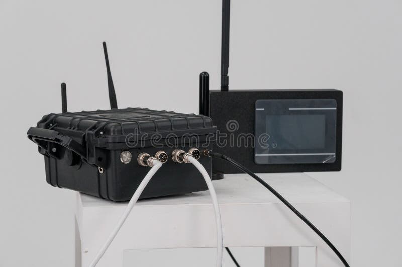 Advanced Electronic Warfare Equipment Displayed on a Minimalist Stand ...