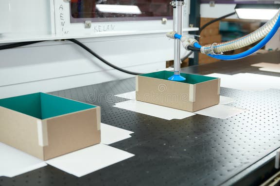 Advanced Robot Technology Streamlines the Gluing Process in a Box Manufacturing Facility Stock ...