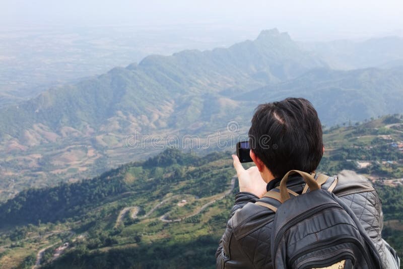 Adventure Man with Gps Device or Phone Outdoors in Wilderness Ex Stock ...