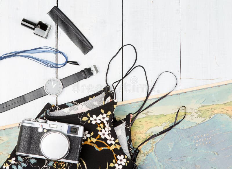 Map, Watch, Camera on White Wooden Table Stock Photo - Image of space ...