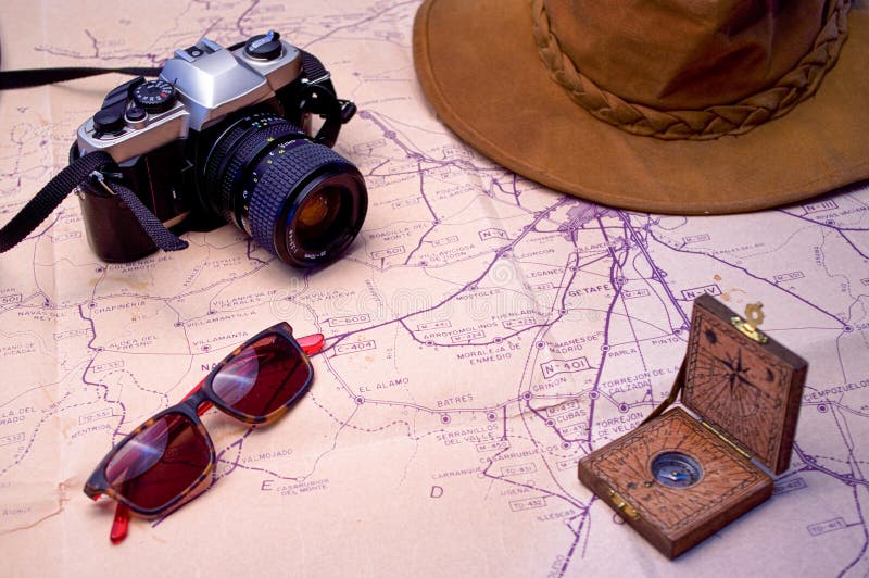 Adventure Travel Equipment with Camera, Hat, Sunglasses and Compass ...