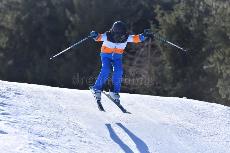 Adventurous Child Skiing: 10-Year-Old Flying Off a Snowy Hill Stock ... Adventurous Child Skiing: 10-Year-Old Flying Off a Snowy Hill Stock ...