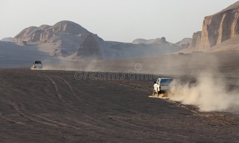 An Adventurous Drive in the Desert with an SUV Off-road Vehicle Stock ...