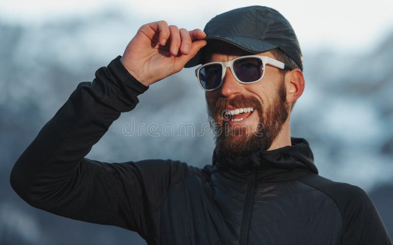 Adventurous Explorer Man with Beard and Glasses Smiling Stock Photo ...