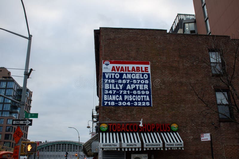 Advertisement on a Wall of a Brick Building in New York Editorial Stock ...