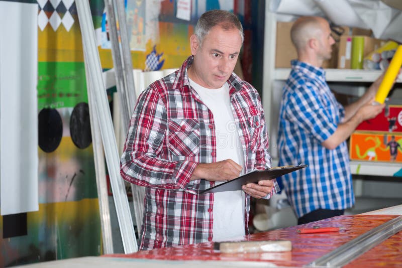 Advertising Agency Worker Preparing for Work Stock Photo - Image of ...