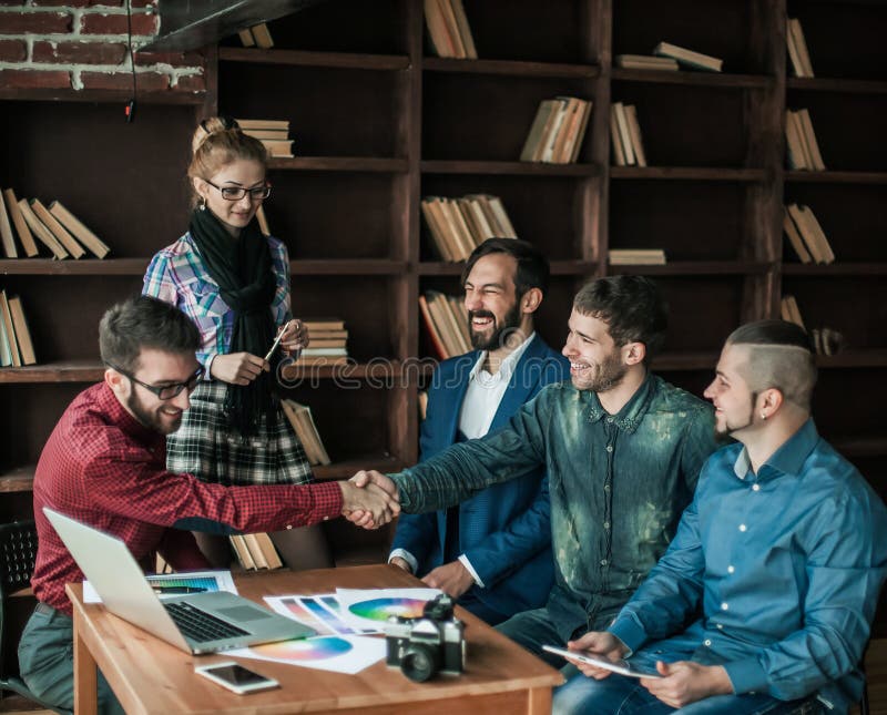 Advertising Manager with a Handshake Greets the Customer Stock Photo ...