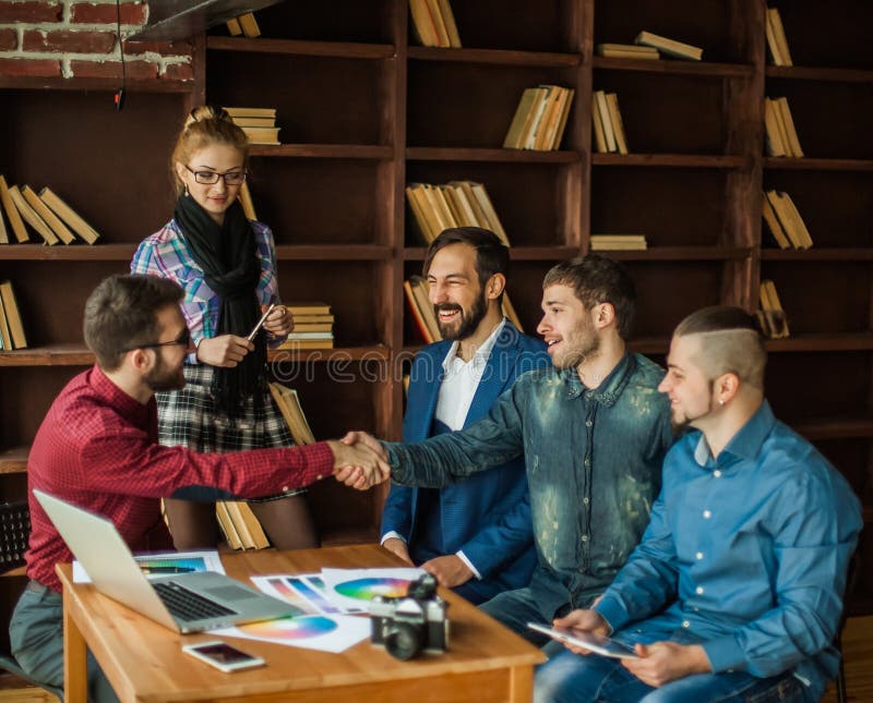 Advertising Manager with a Handshake Greets the Customer Stock Photo ...
