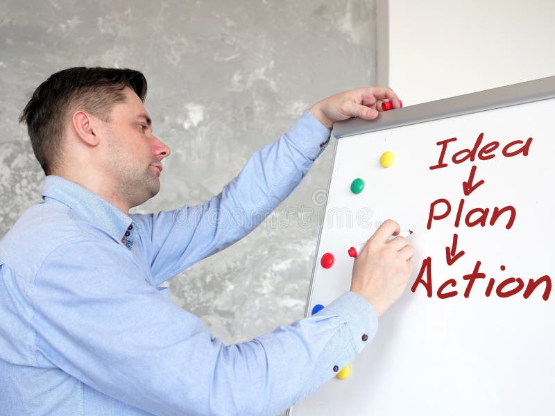 Advisor Writes an Idea Plan Action on the White Board. Stock Photo ...