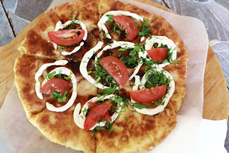 Adyghe pita bread on plate stock image. Image of eating - 254871337