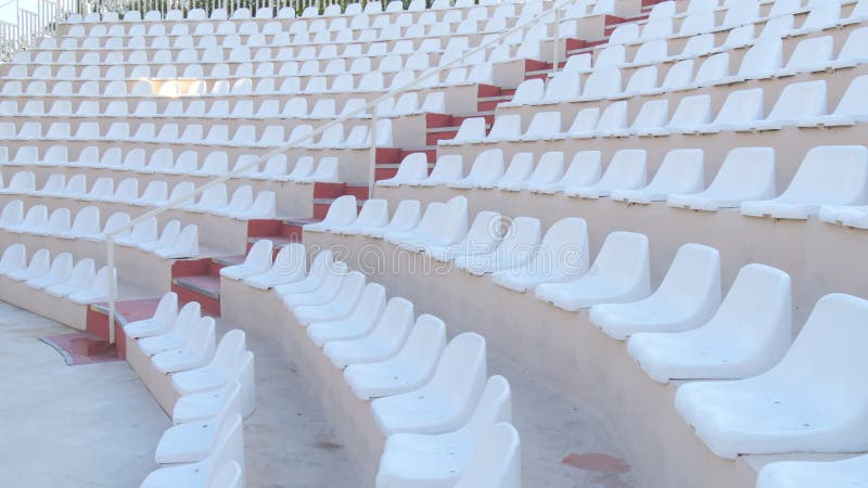 White Chairs of an Empty Amphitheater or Stadium Under the Open Sky. a ...