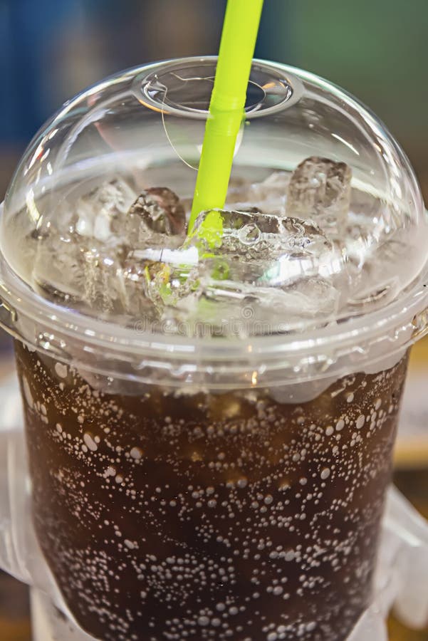 Aerated Soft Drink with Ice in Plastic Glass Stock Photo - Image of ...