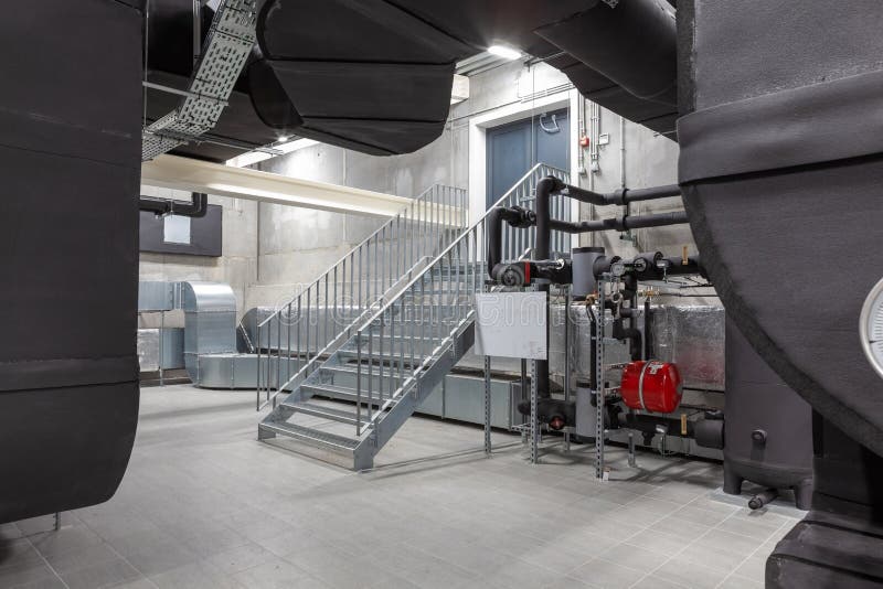 An Long Ventilation Pipe in a Technical Room in the Basement of a Large ...