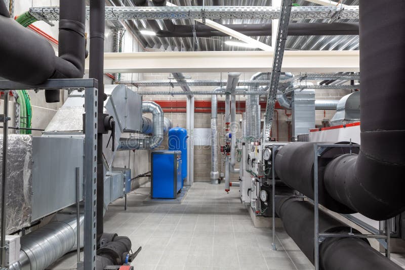 An Long Ventilation Pipe in a Technical Room in the Basement of a Large ...