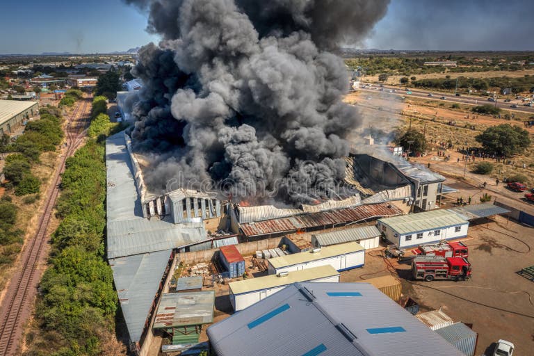 Aerial burning warehouse stock photo. Image of black - 233152004