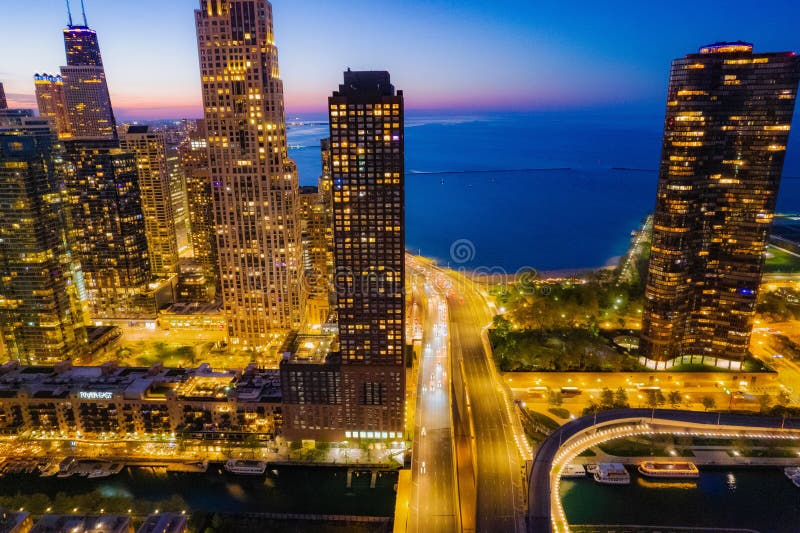 Aerial Chicago Skyline with Golden Lights at Sunset Editorial ...