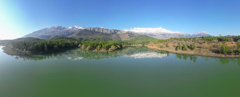 Aerial 180 Degree View of Lake Reflections and Amazing Views in Spring ...