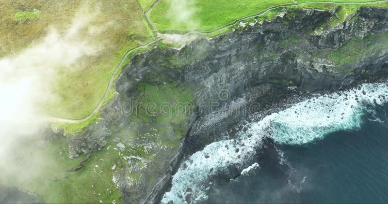 Flying in the Clouds Above the Cliffs of Moher in 4k Stock Footage ...