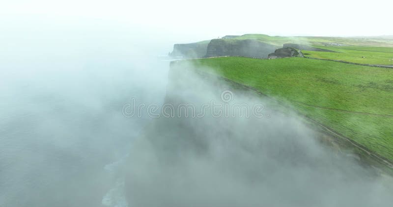 Flying in the Clouds Above the Cliffs of Moher Stock Video - Video of ...