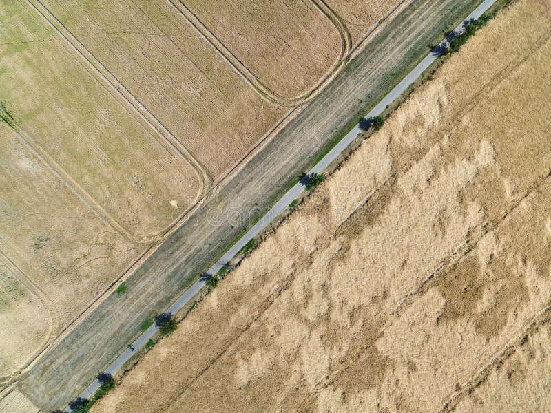 Aerial Drone View of a Bike Path Passing through Fields Stock Image ...