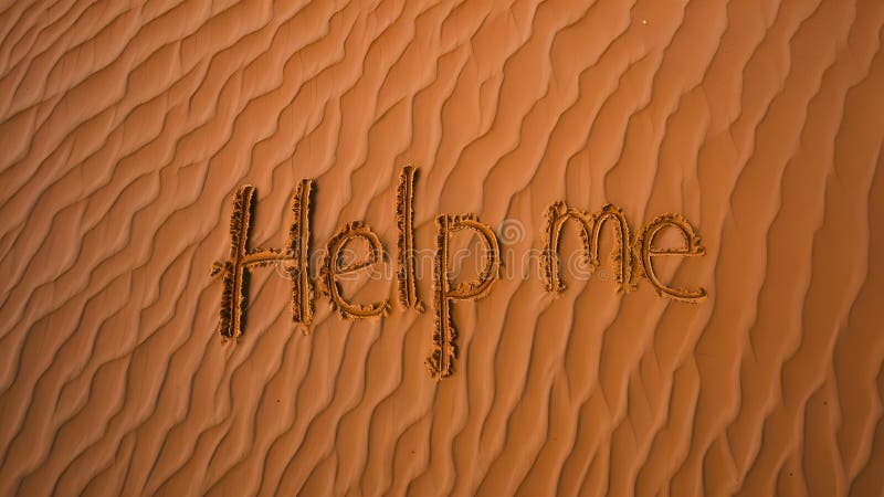 Aerial Drone View of a Desert with Text Sign Message Help Me Written on ...