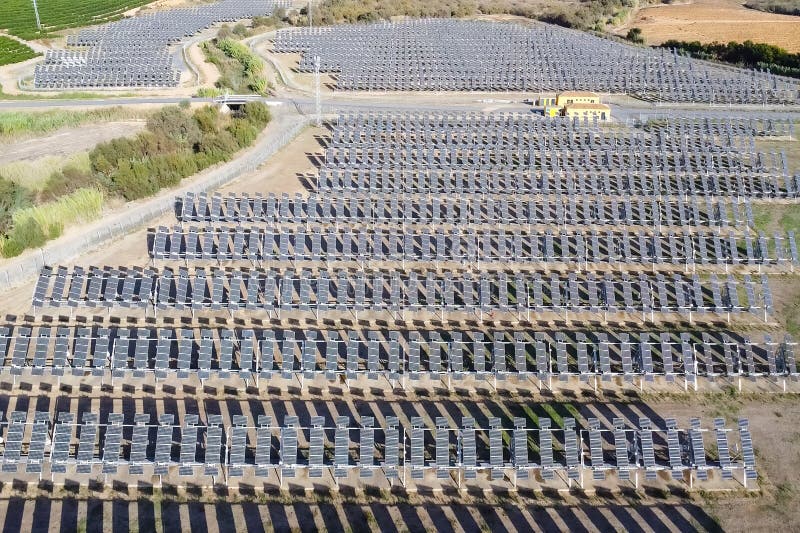 Aerial Drone View of a Farm of Solar Panels between Crop Fields Stock ...