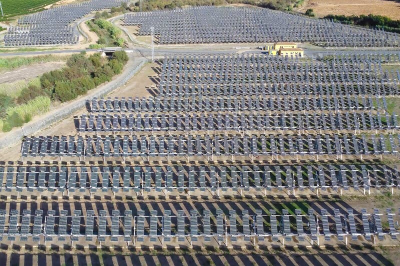 Aerial Drone View of a Farm of Solar Panels between Crop Fields Stock ...