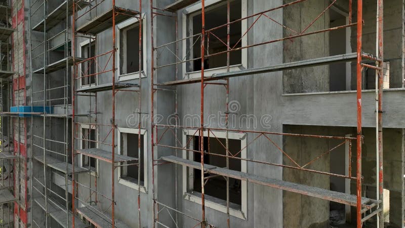 Builders Work Facing the Building Stand on the Scaffolding Stock Video ...