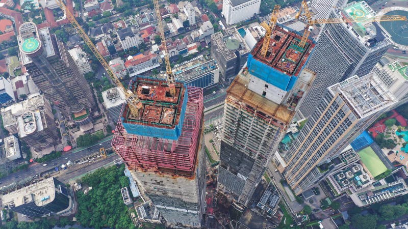 Aerial Flight Over a New Constructions Development Site with High Tower ...