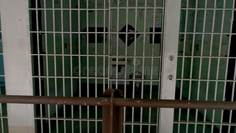 Aerial Flyby of the Second Floor of an Abandon State Prison Stock ...