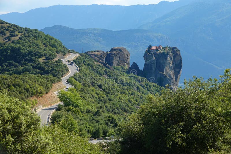 AERIAL: Flying Towards a Scenic Country Road Leading Towards a Town on ... AERIAL: Flying Towards a Scenic Country Road Leading Towards a Town on ...