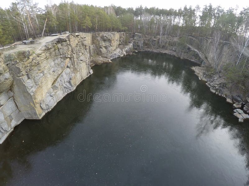 Aerial Footage of Granite Quarry Mining in Forest Stock Photo - Image ...