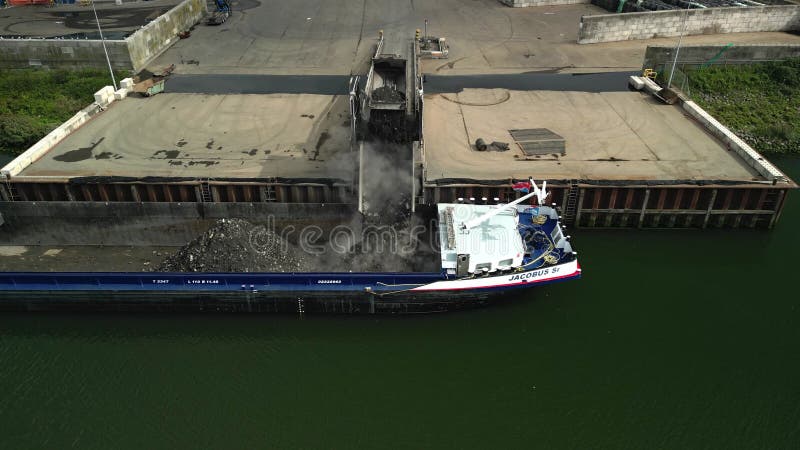 Aerial Footage of the Process of Dumping the Incinerated Waste into a ...