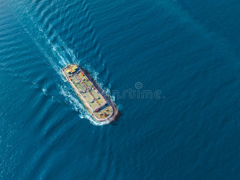 Aerial Front Side View of Small Mini Oil Tanker Ship Sailing on Open ...