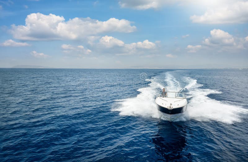 Aerial Front View of a Speedboat Cruising Over the Ocean Stock Photo ...