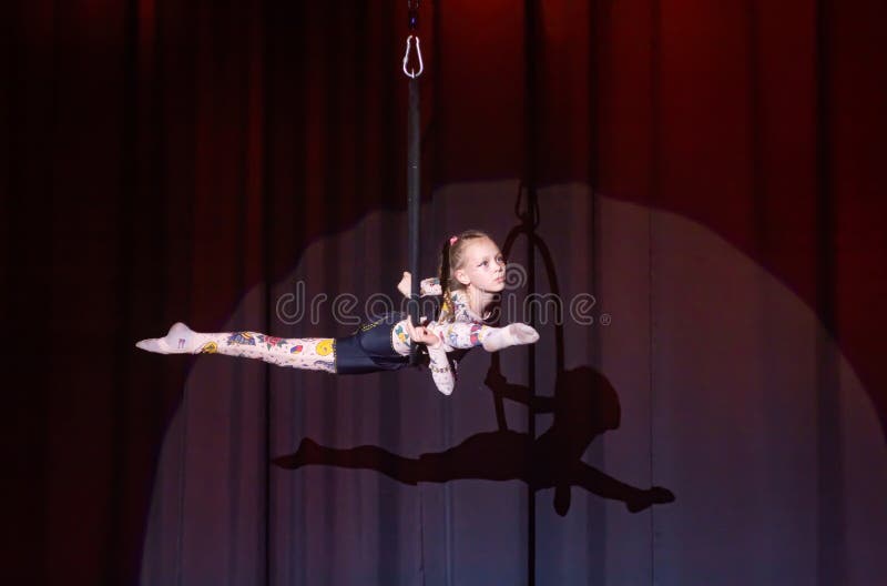 Aerial Gymnastics. Performance of an Aerial Gymnast. Editorial ...