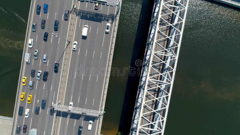 River Bridge with a Young Man Standing on it and Drinking with His ...