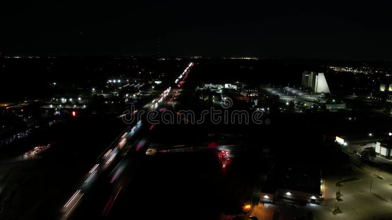Aerial Hyper-lapse at Night of the Highway with on-ramp and Exit Ramp ...