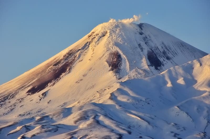 Volcano covered with snow stock image. Image of sidelight - 19988661