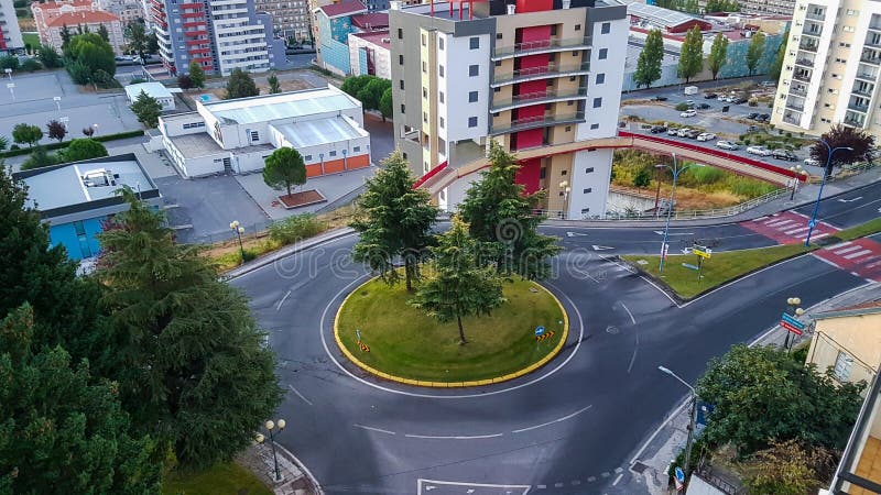An Aerial Image of a Traffic Island with Circles Around the Outside ...
