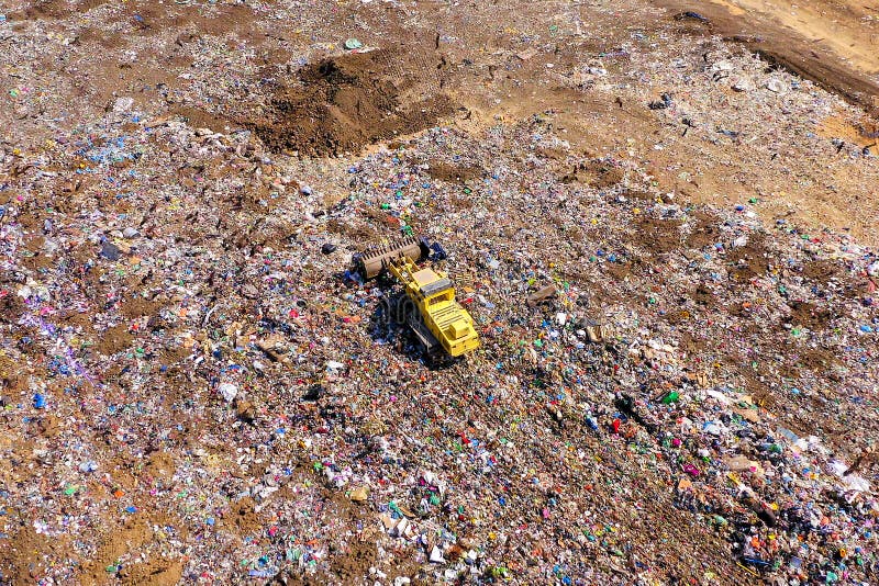 Yellow Landfill Compactor at Municipal Solid Waste Compound. Stock ...