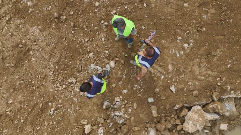 Active Site: Aerial 4K View of Construction Equipment and Crew Stock ...