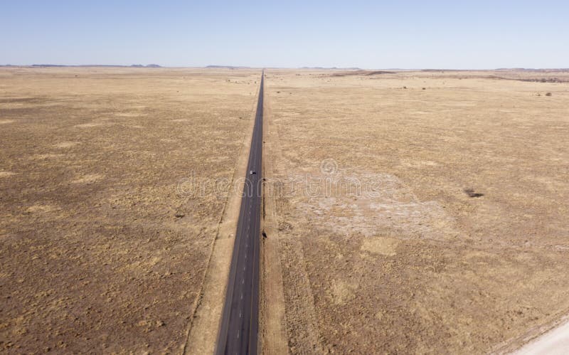 Aerial of Long Straight Road in a Flat Landscape Stock Photo - Image of ...