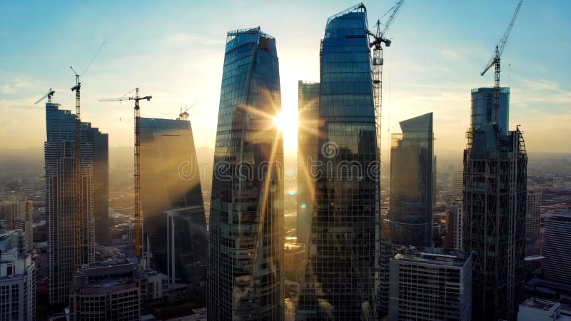 Aerial Medium Shot of a Developing City Skyline with Modern Glass ...