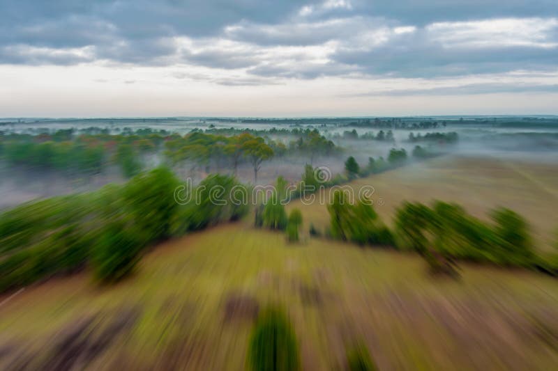 Aerial Motion Blurred Landscape Under a Dramatic Sky Stock Photo ...