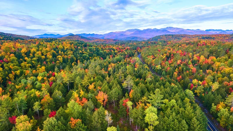Aerial Over Hills and Mountains of Peak Fall Forests with Road Winding ...
