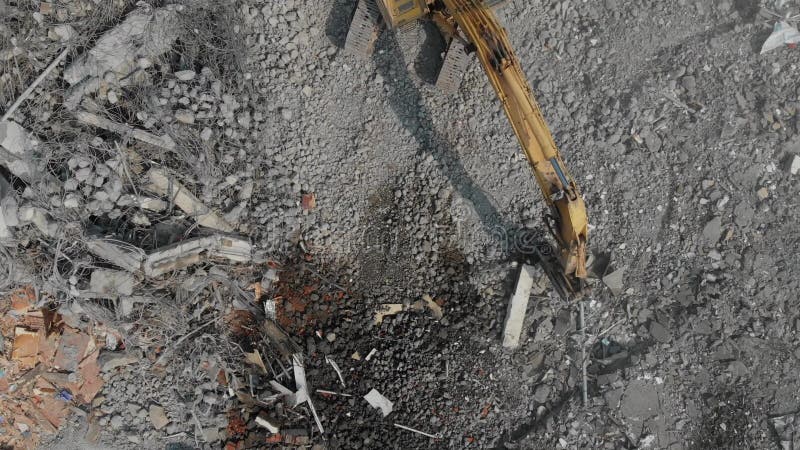 Aerial Overhead Moving Forward View of a Demolition Site with Two ...
